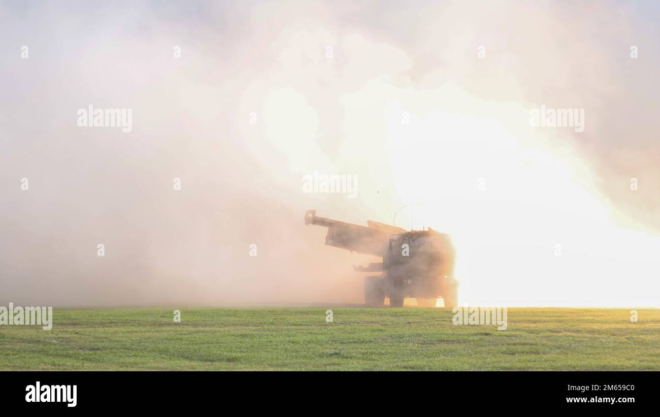 U.S. Marines with 10th Marine Regiment, 2d Marine Division, fire a ...