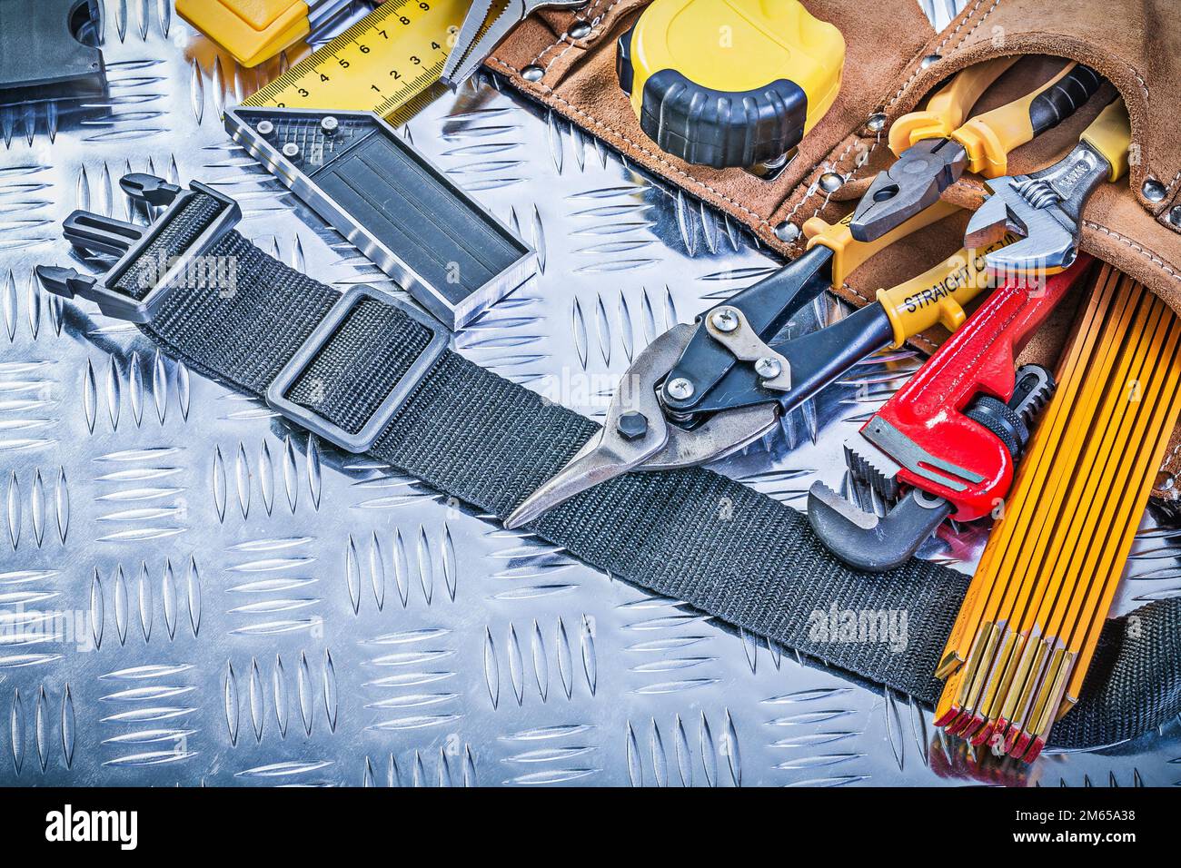 Leather tool belt with construction tooling on channeled metal ...