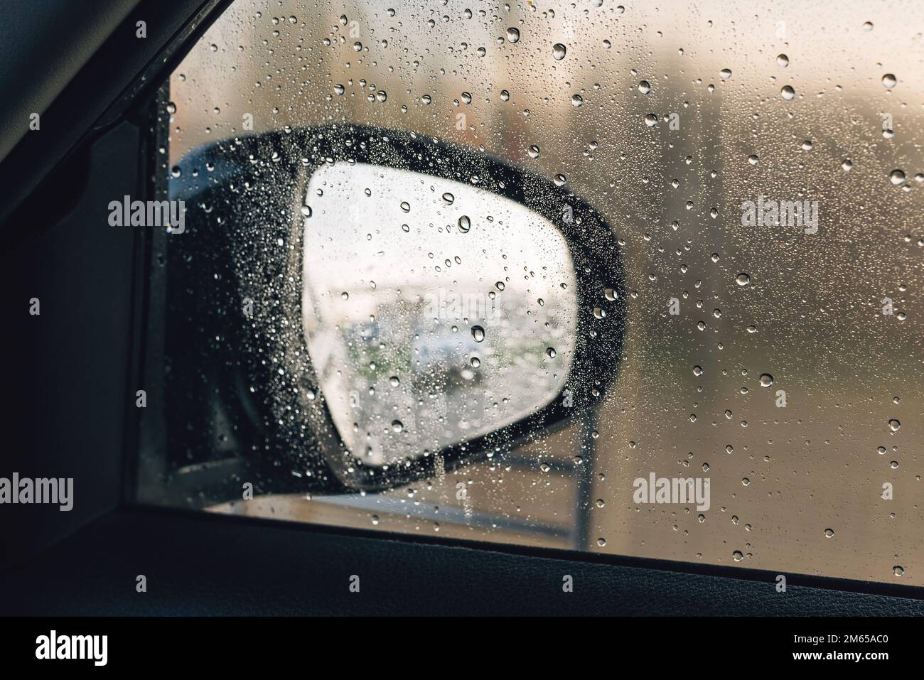 Car side wing rear view mirror with water drop in carwash service ...