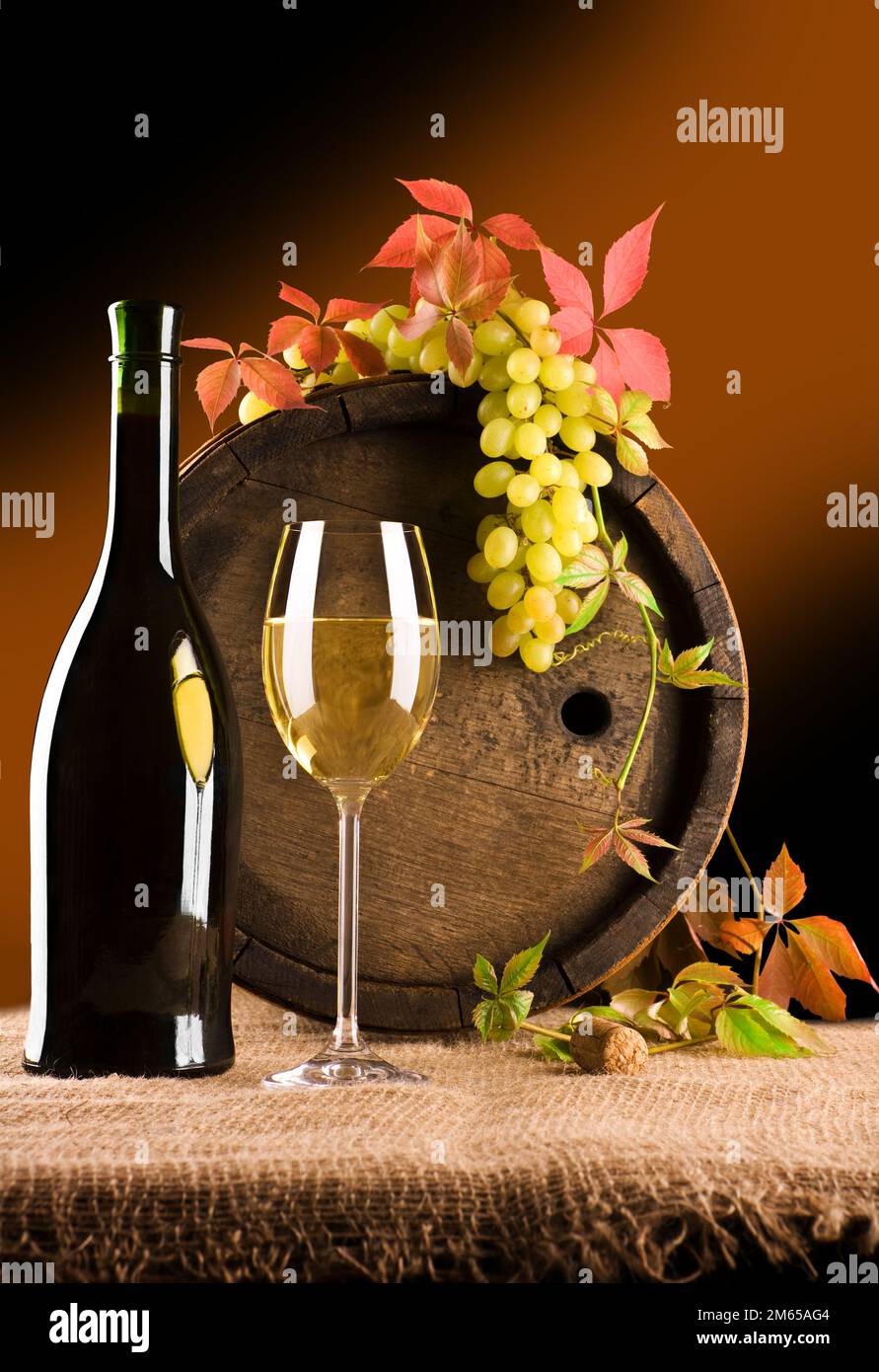 still life of wine barrel glass grape composition Stock Photo - Alamy
