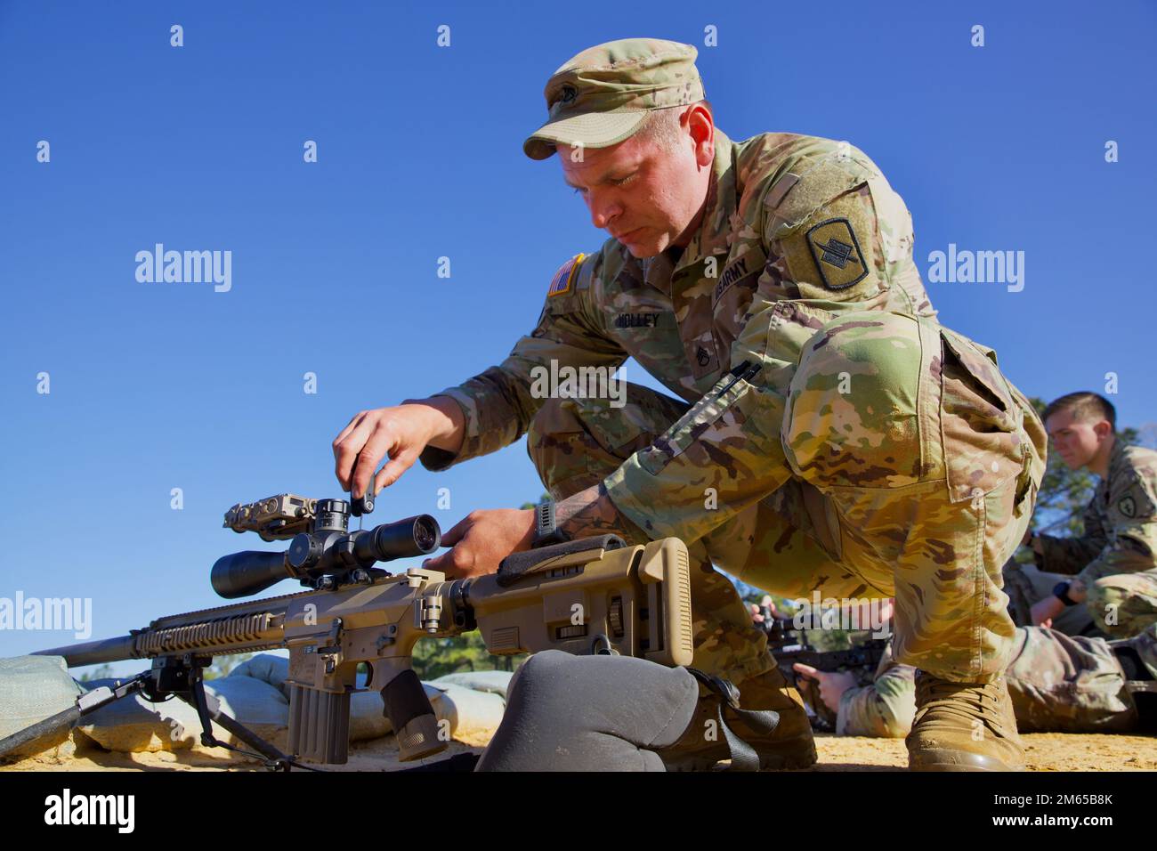 U.S. Army Staff Sgt Benjamin Holley, a Army Sniper assigned to ...