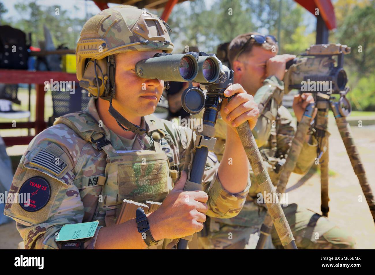 U.S. Army Staff Sgt Caleb Ash, a Army Sniper assigned to Headquarters ...