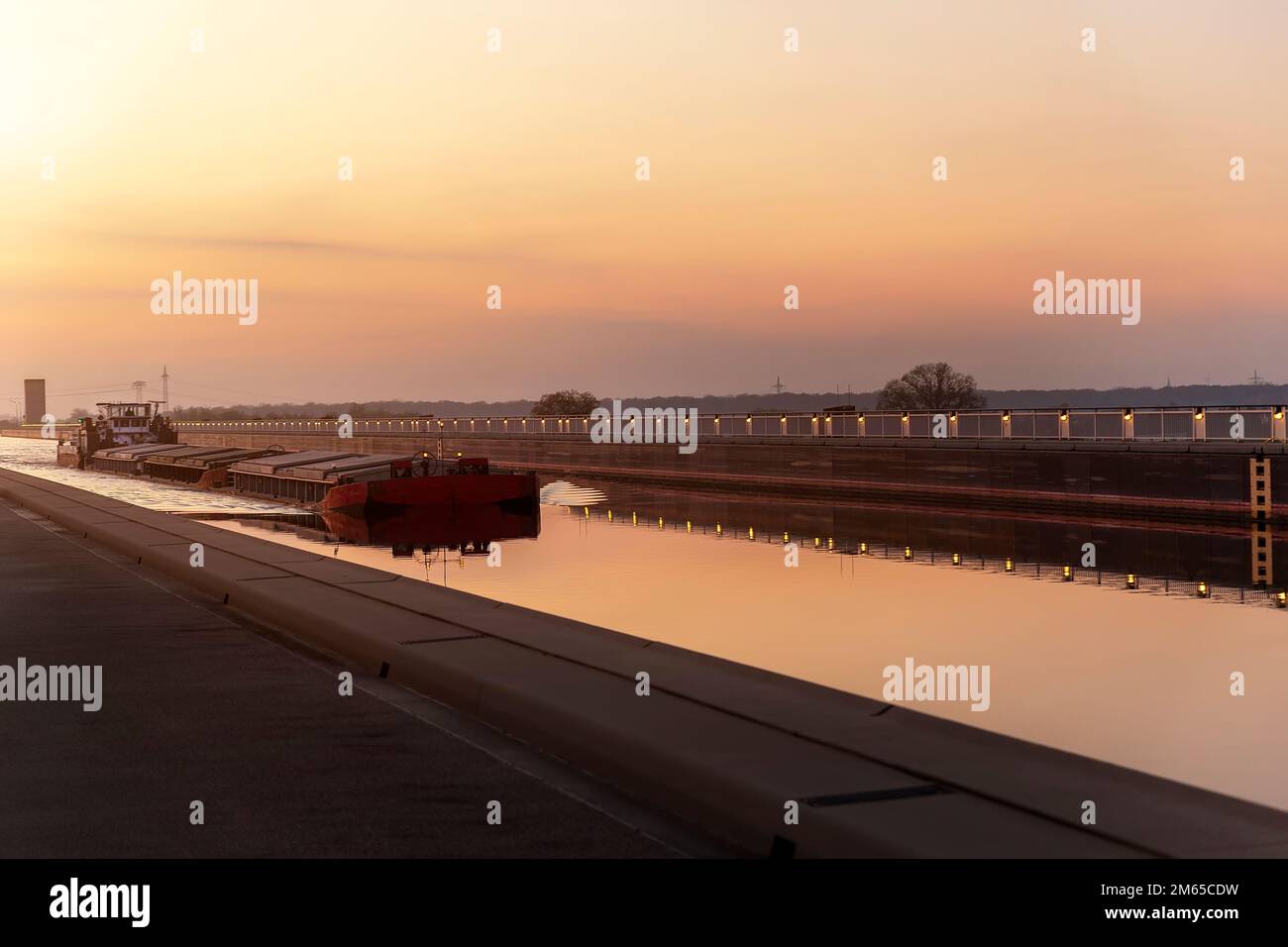 Scenic view od big cargo freight tugboat barge boat ship sailing by ...