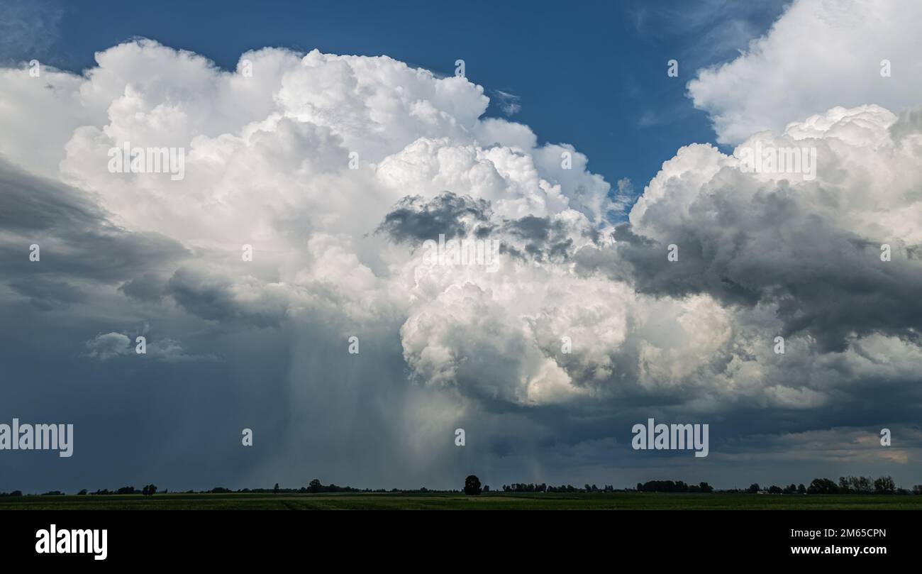 Storm clouds over field, tornadic supercell, extreme weather, dangerous ...