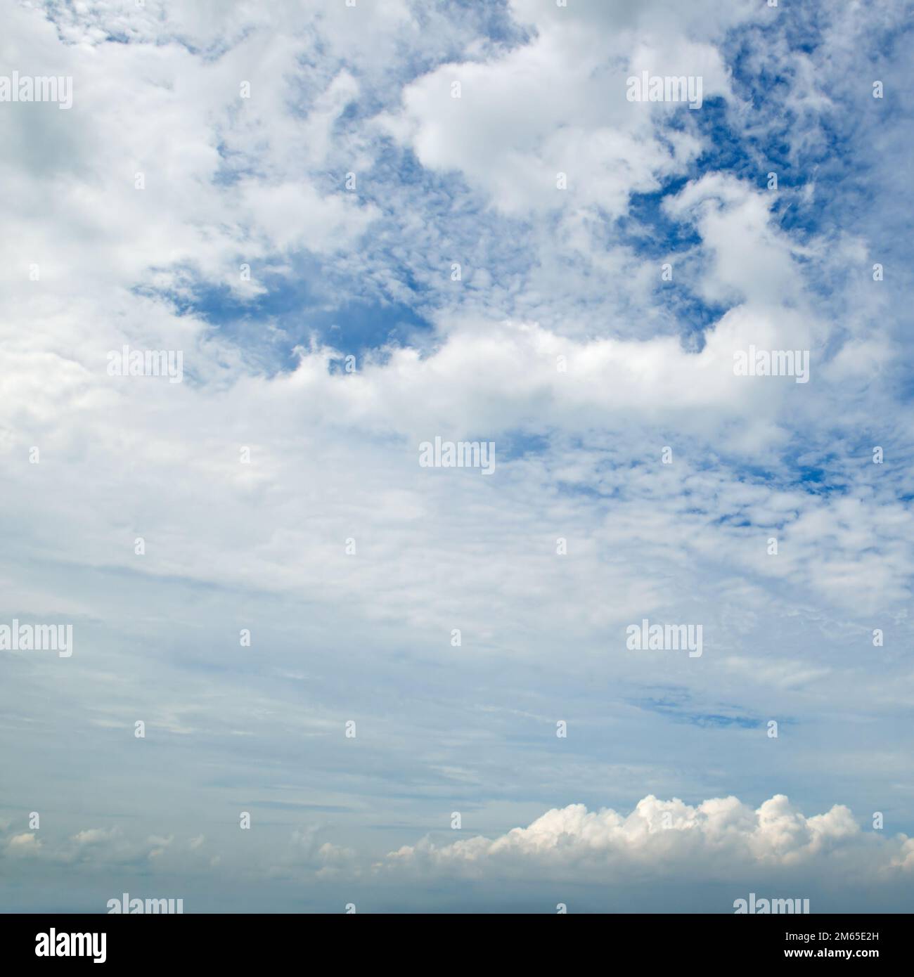 Blue sky and light cumulus clouds Stock Photo - Alamy