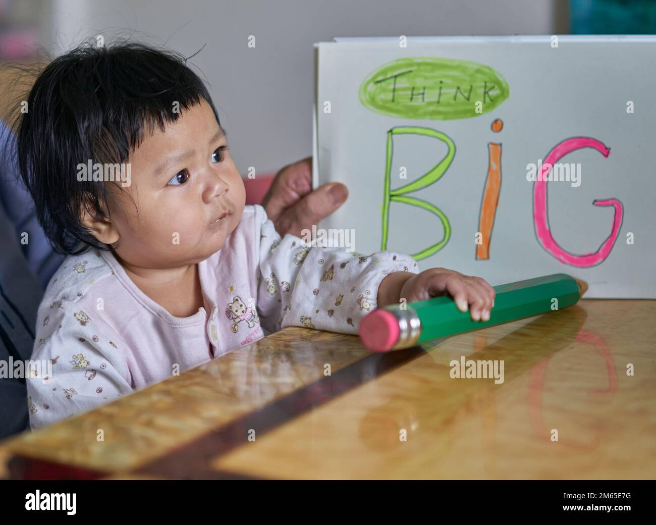 An adorable child, early learning and think big concept Stock Photo - Alamy