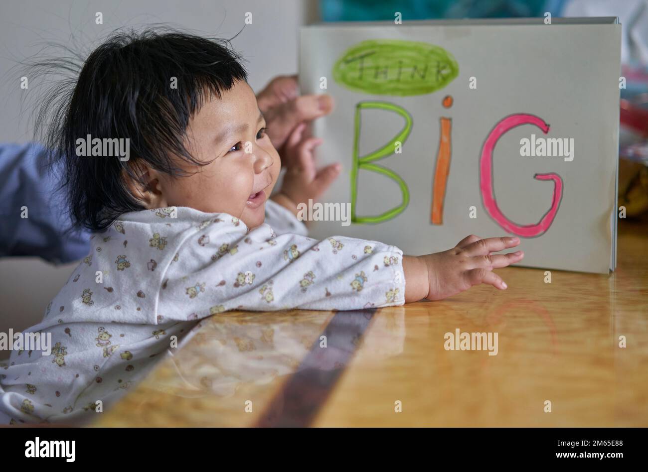 An adorable child, early learning and think big concept Stock Photo - Alamy