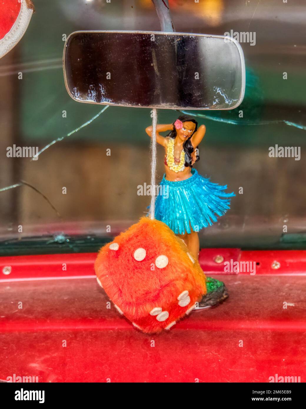 Fuzzy Dice and Hula Dancer for Car Dash Stock Photo - Alamy