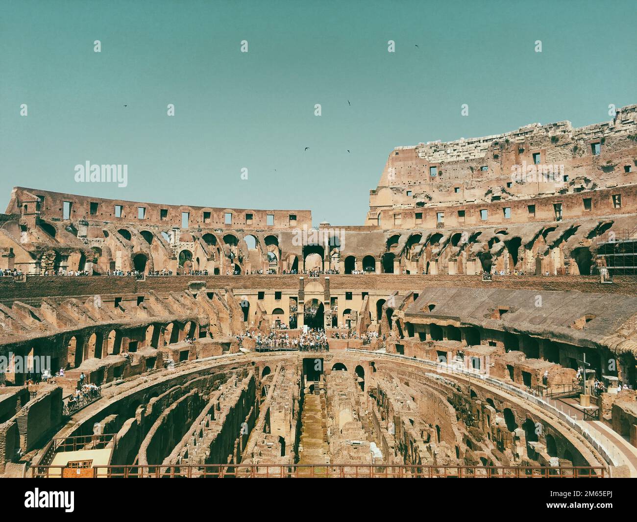 The Colosseum on the background of the bright blue sky Stock Photo - Alamy