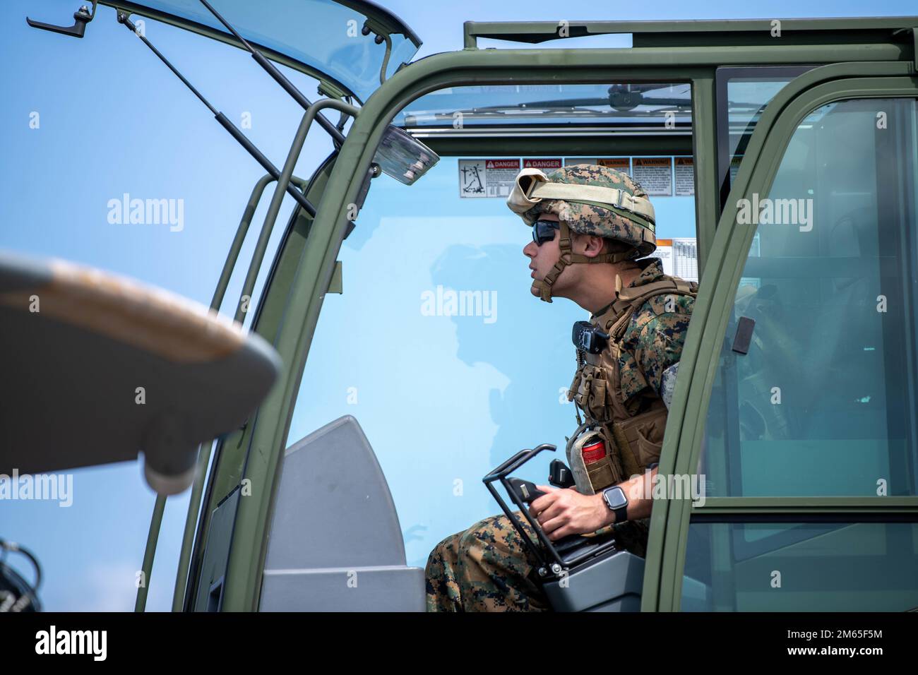 A U.S. Marine assigned to Marine Wing Support Squadron 172 operates an ...