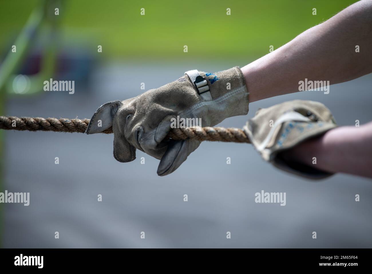 An Airman assigned to the 18th Equipment Maintenance Squadron pulls a ...