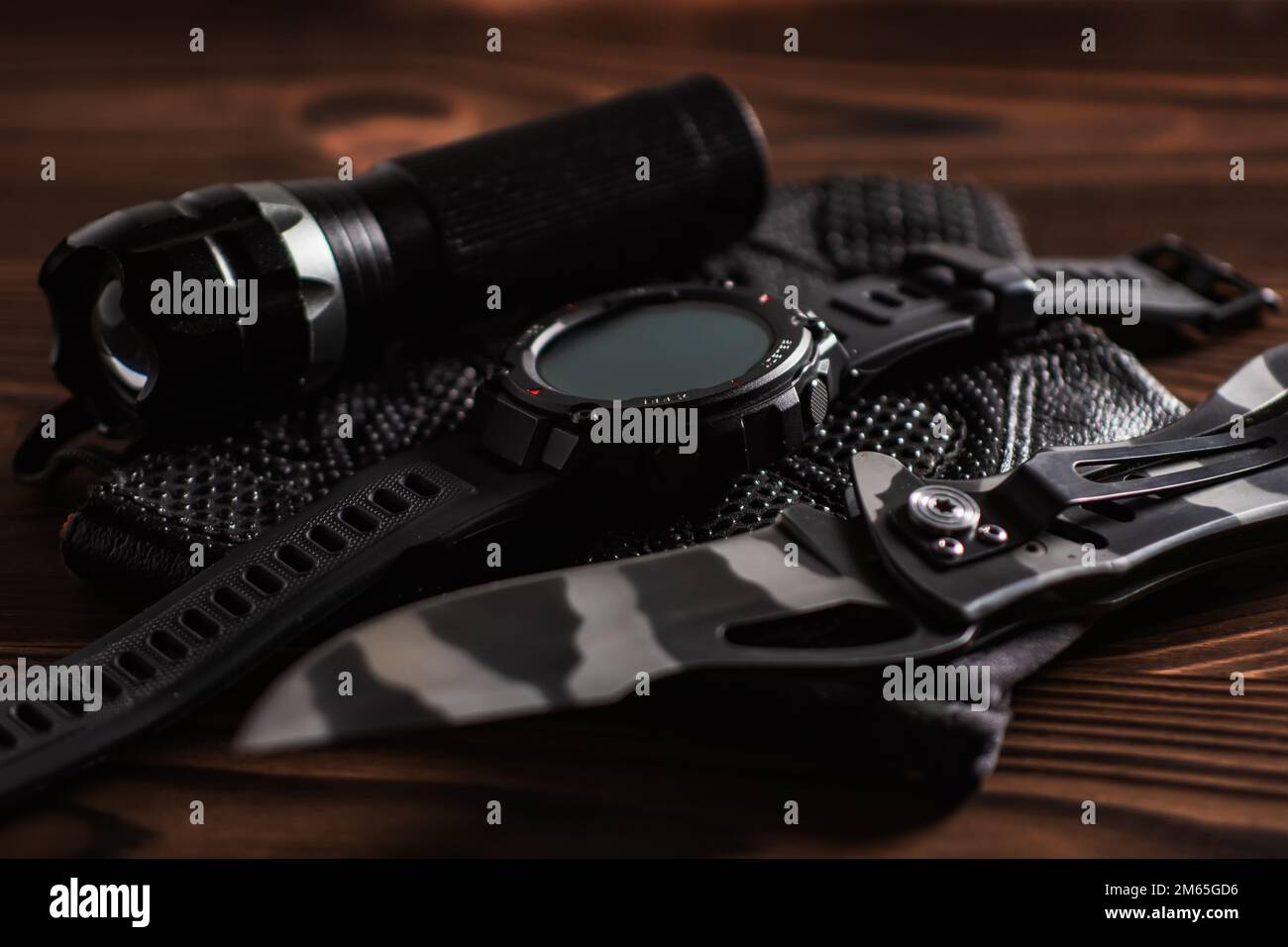Everyday carry EDC items for men in black color - flashlight, watch and ...