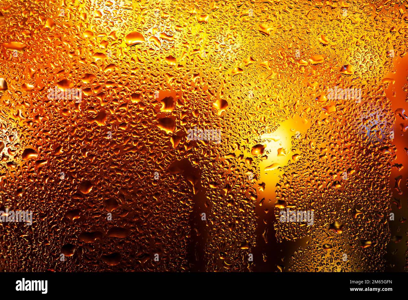 Water drops and condensation in a window glass. Abstract background ...