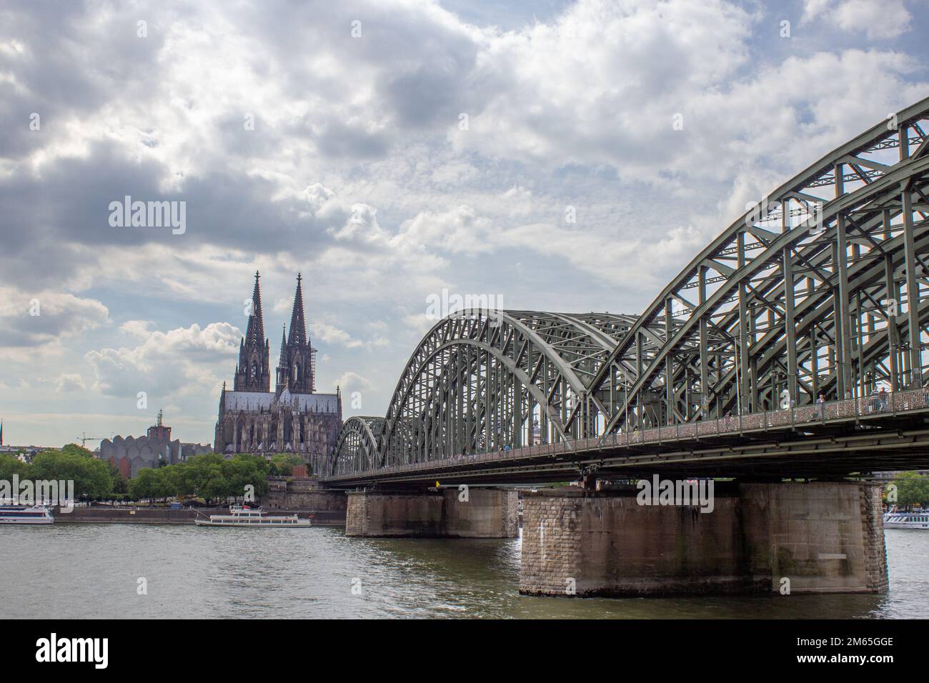 Cityscape of Cologne with Hohenzollern bridge, cathedral, Saint Martin ...