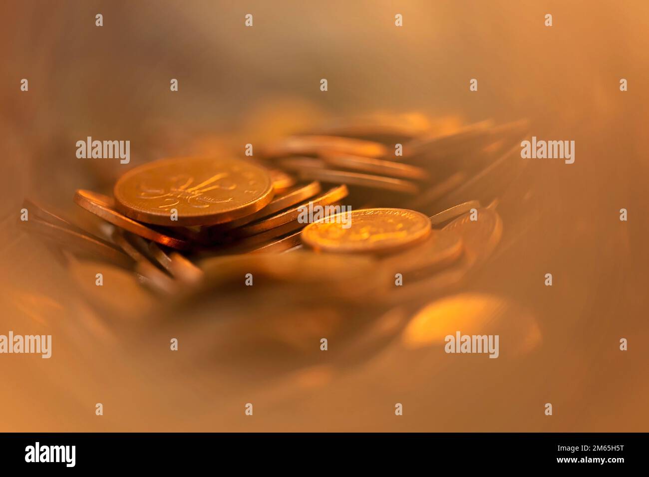 UK Currency shot in beautiful light with bokeh effect.British coins ...