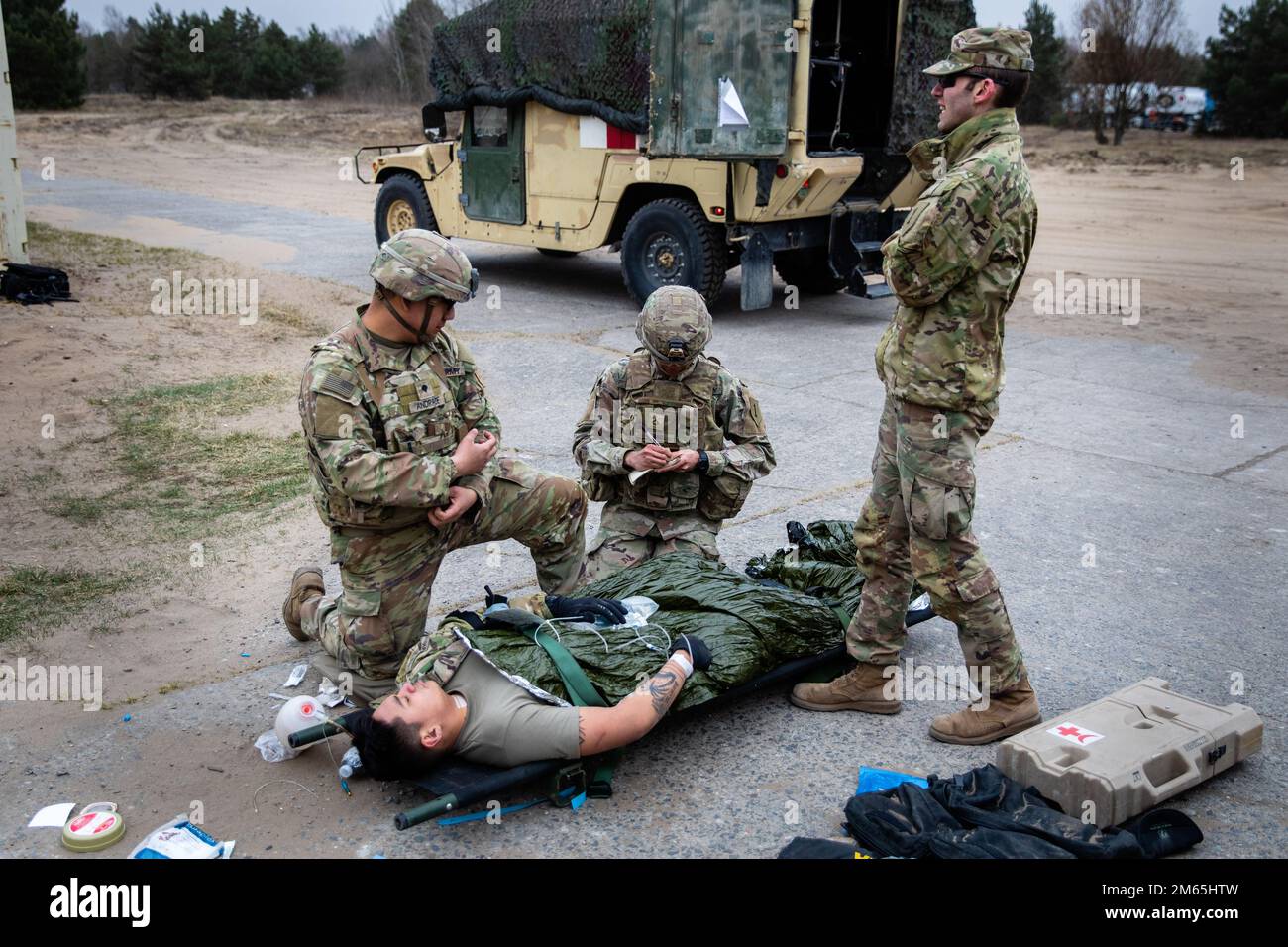 From left, Spc. Damian Andrade and Pfc. Thomas Huang, both combat medic ...