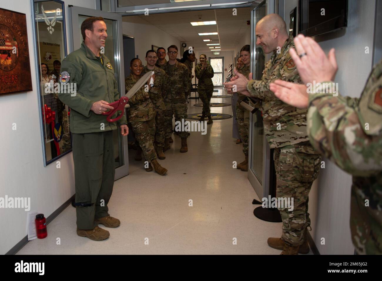 U.S. Air Force Col. Leslie Hauck, 52nd Fighter Wing commander, left ...