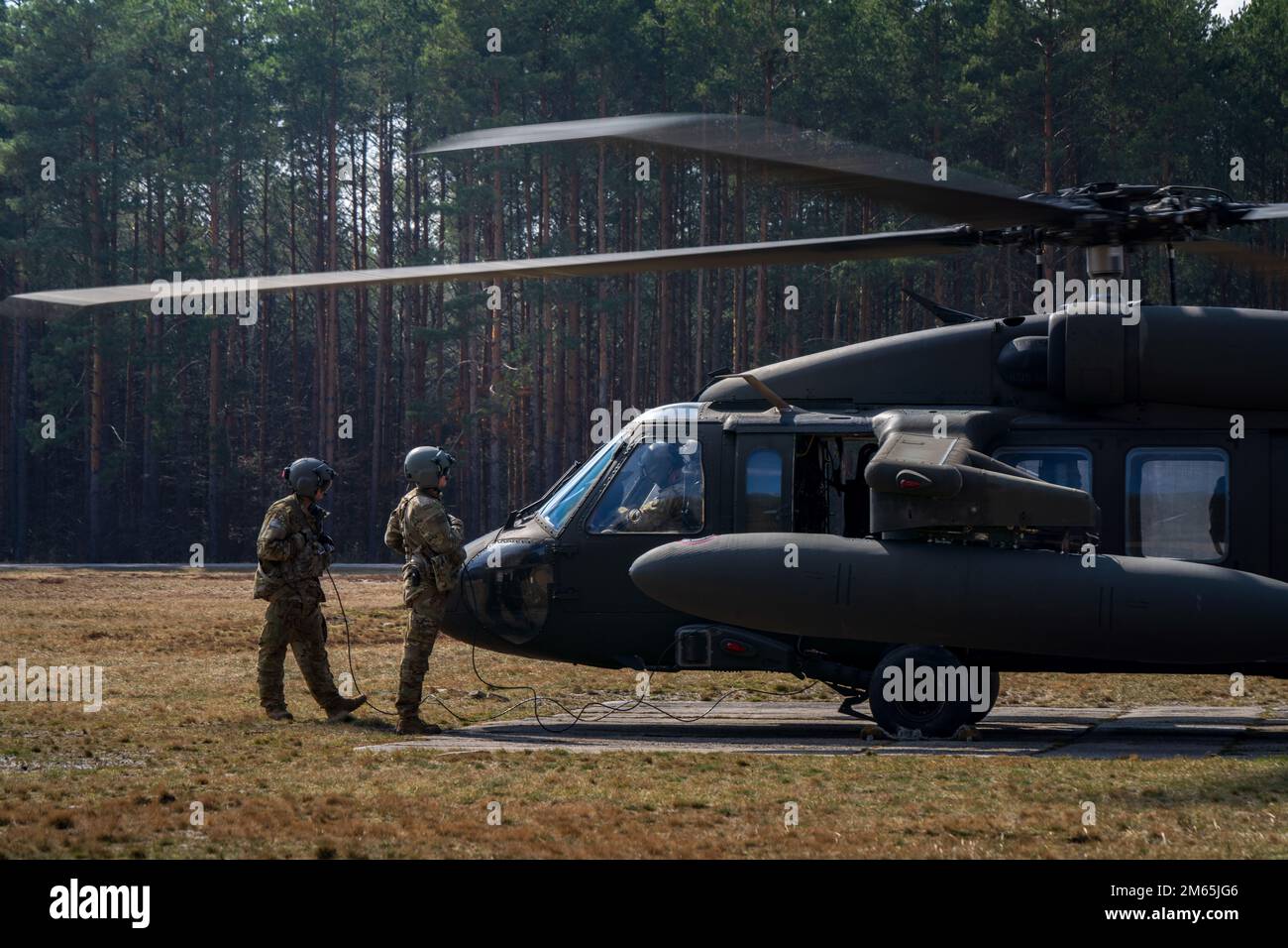 A UH-60 Blackhawk helicopter aircrew from the 1-214th General Support ...