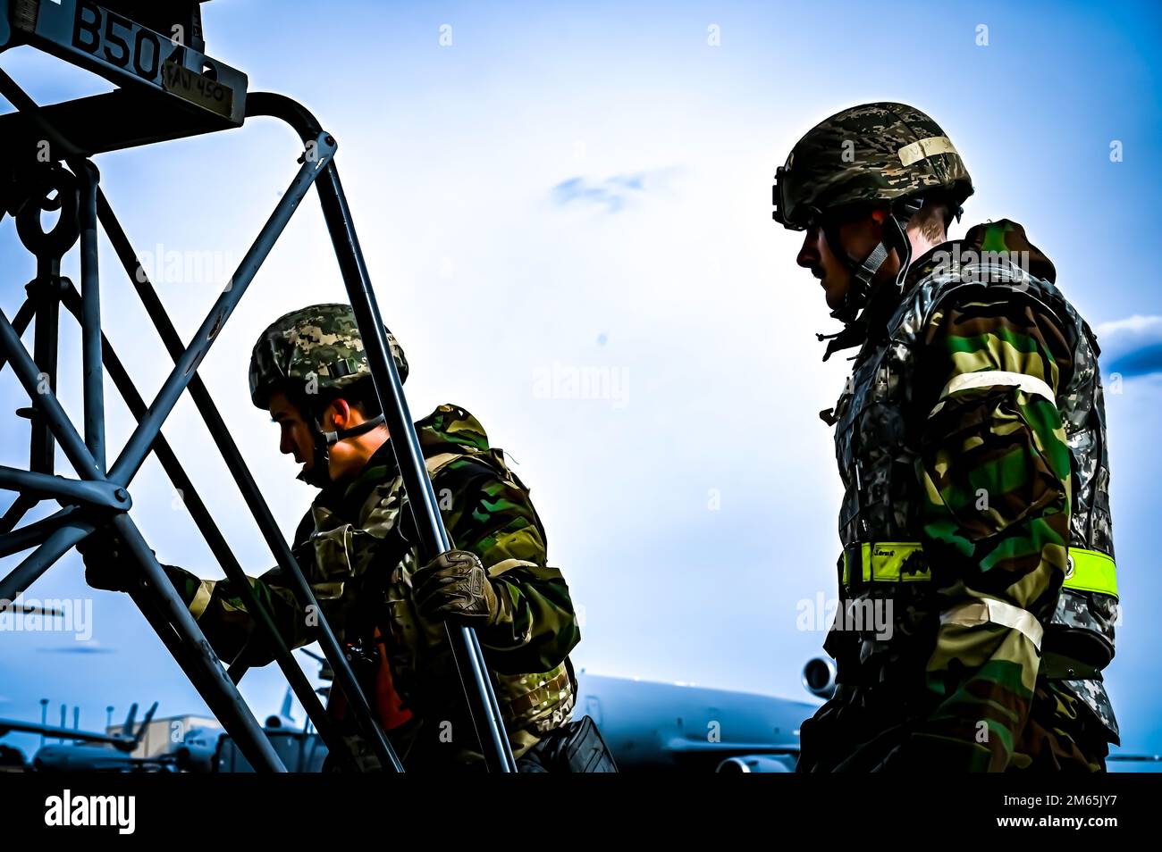 U.S. Air Force Airmen from the 305th Air Mobility Wing wearing mission ...