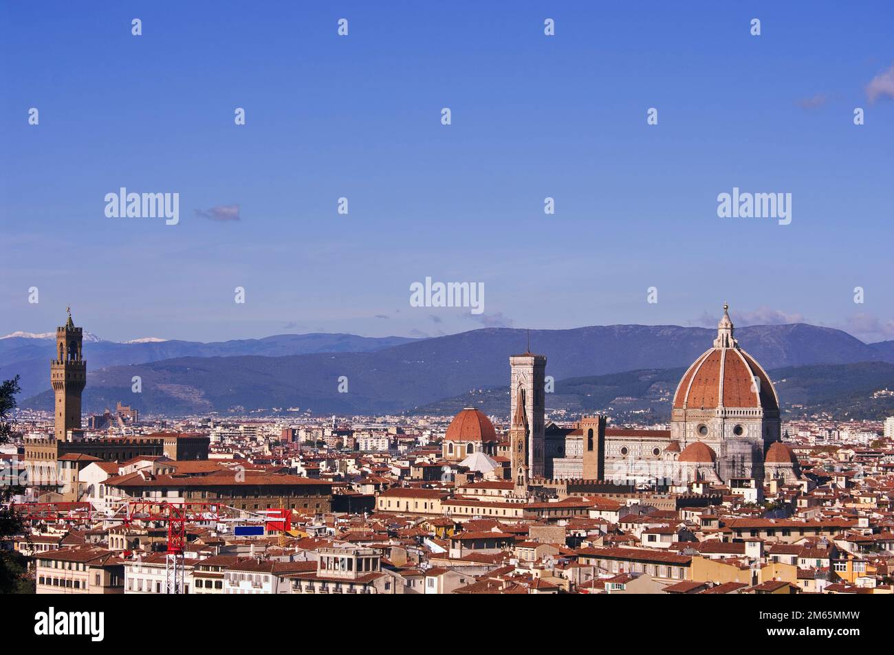 Aerial view of the city of Florence in Tuscany Italy with the mountains ...
