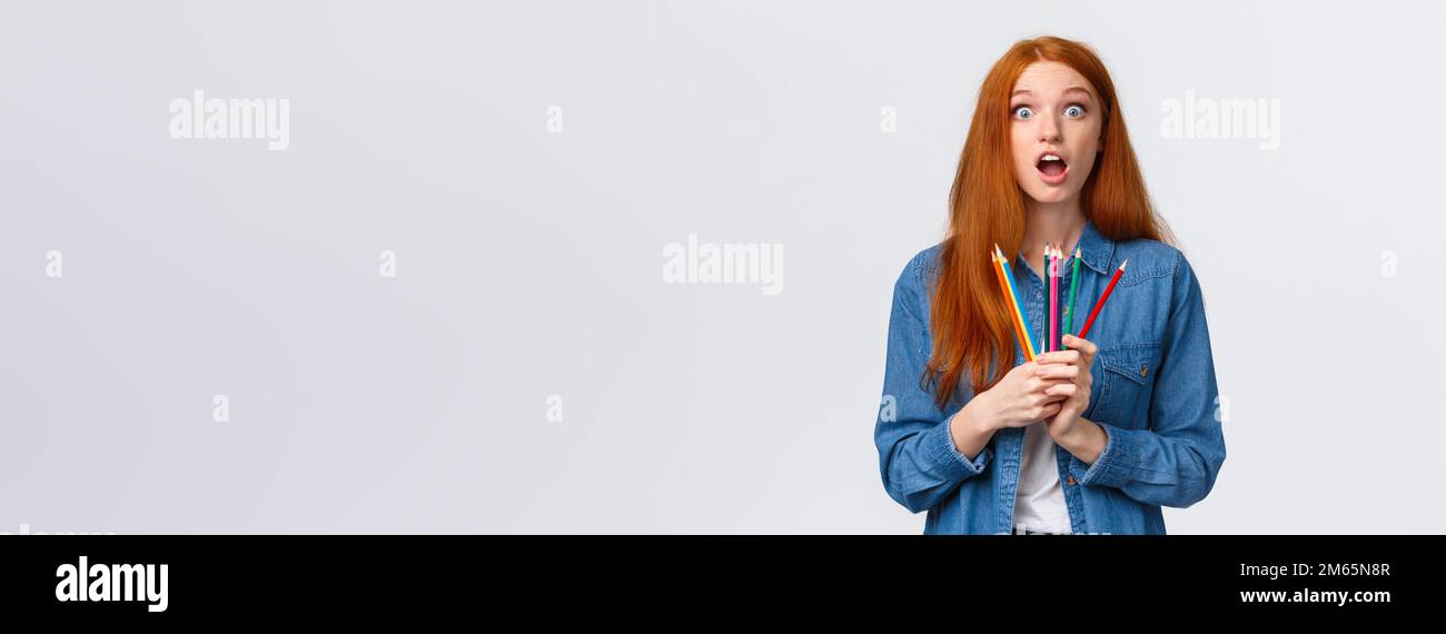 Fascinated and amused attractive redhead teenage girl, college student ...