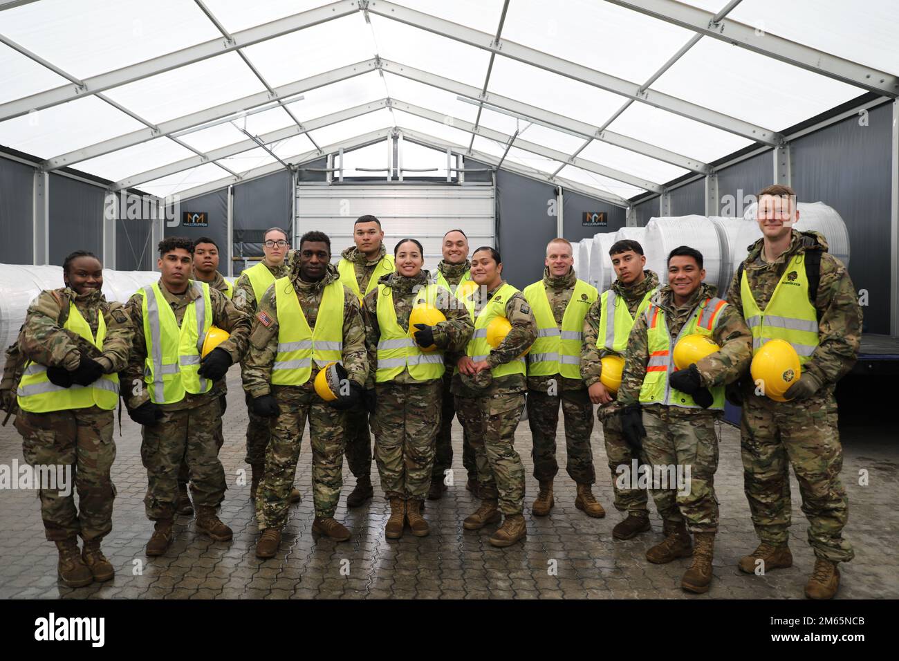 Capt. Zachary Zanetti (far right) commands the 260th Movement Control ...