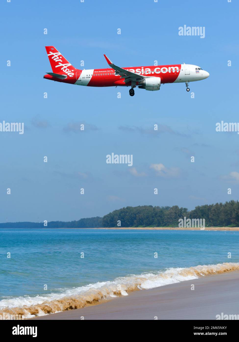 Thai AirAsia Airbus A320 aircraft over Mai Khao Beach before landing at ...