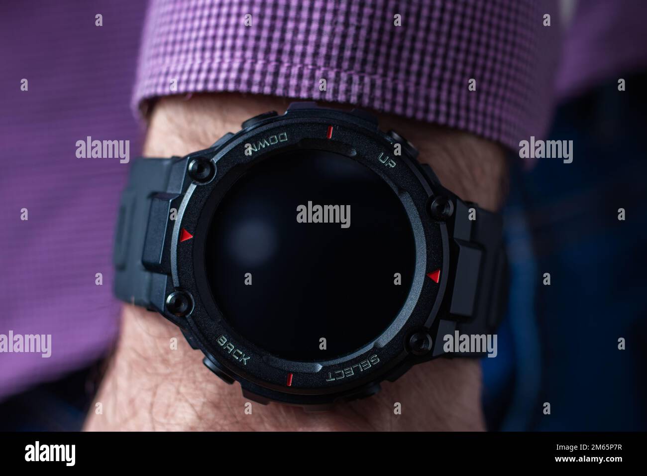 Hand of man wearing trendy smart watch. Modern gadget that lets you ...