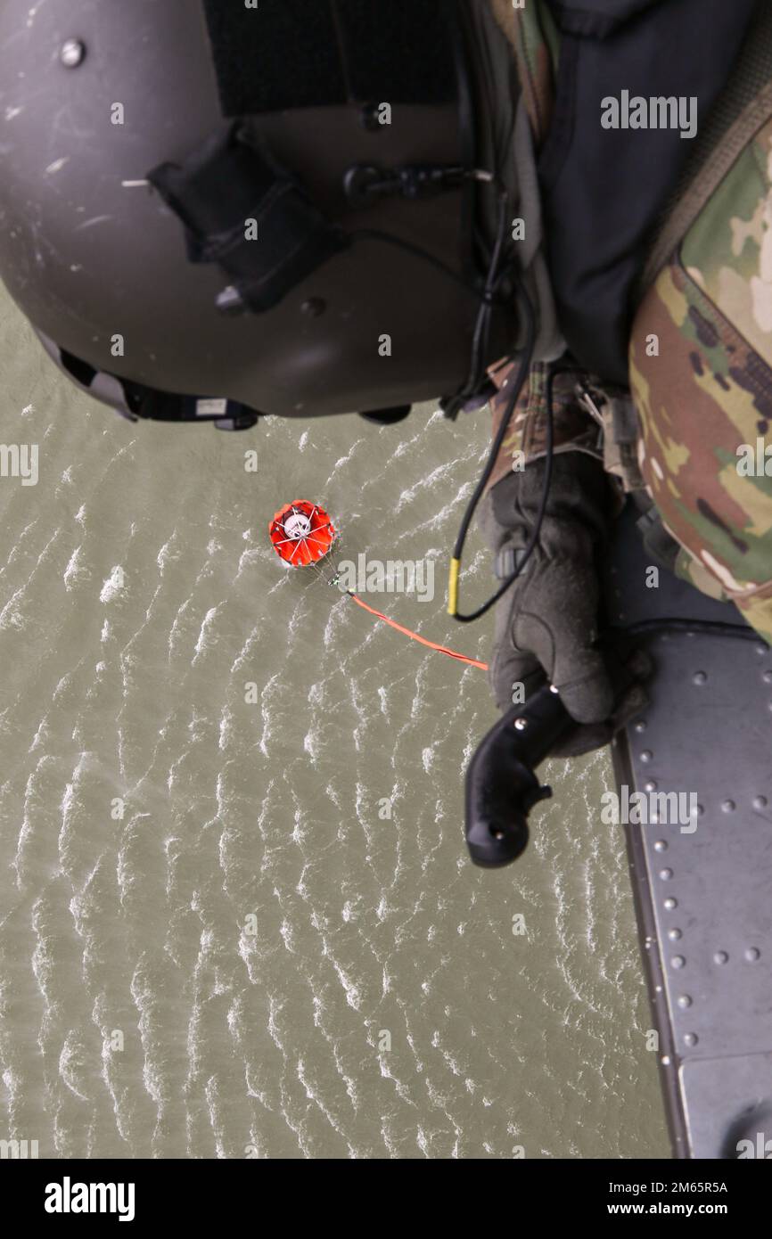 Sgt. 1st Class Kyle Moyer, a UH-60M Black Hawk helicopter crew chief ...