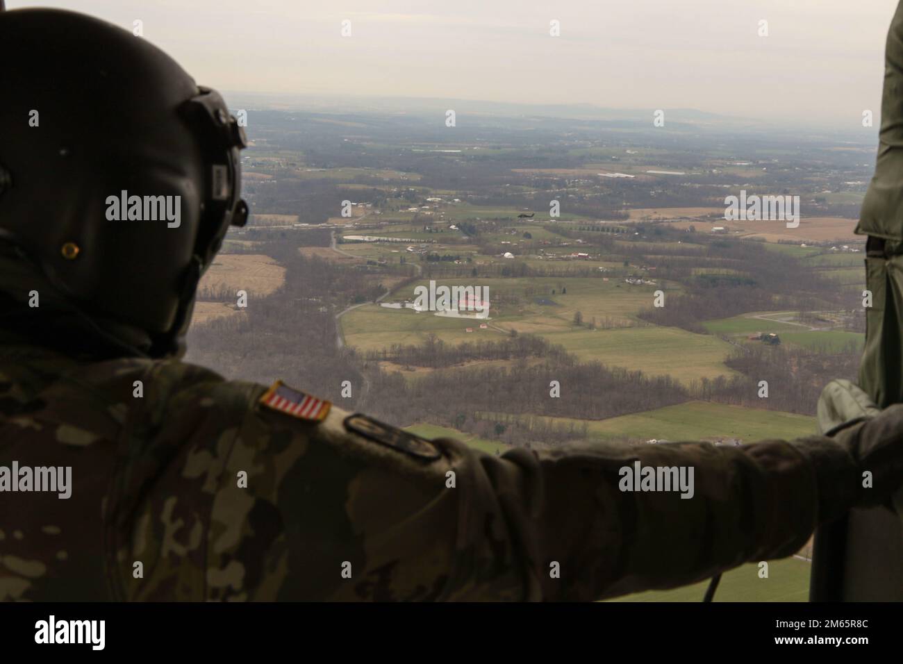 Sgt. 1st Class Kyle Moyer, a UH-60M Black Hawk helicopter crew chief ...