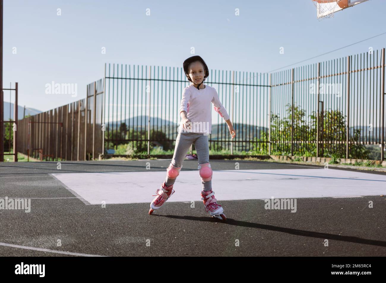 Child inline skating hi-res stock photography and images - Alamy