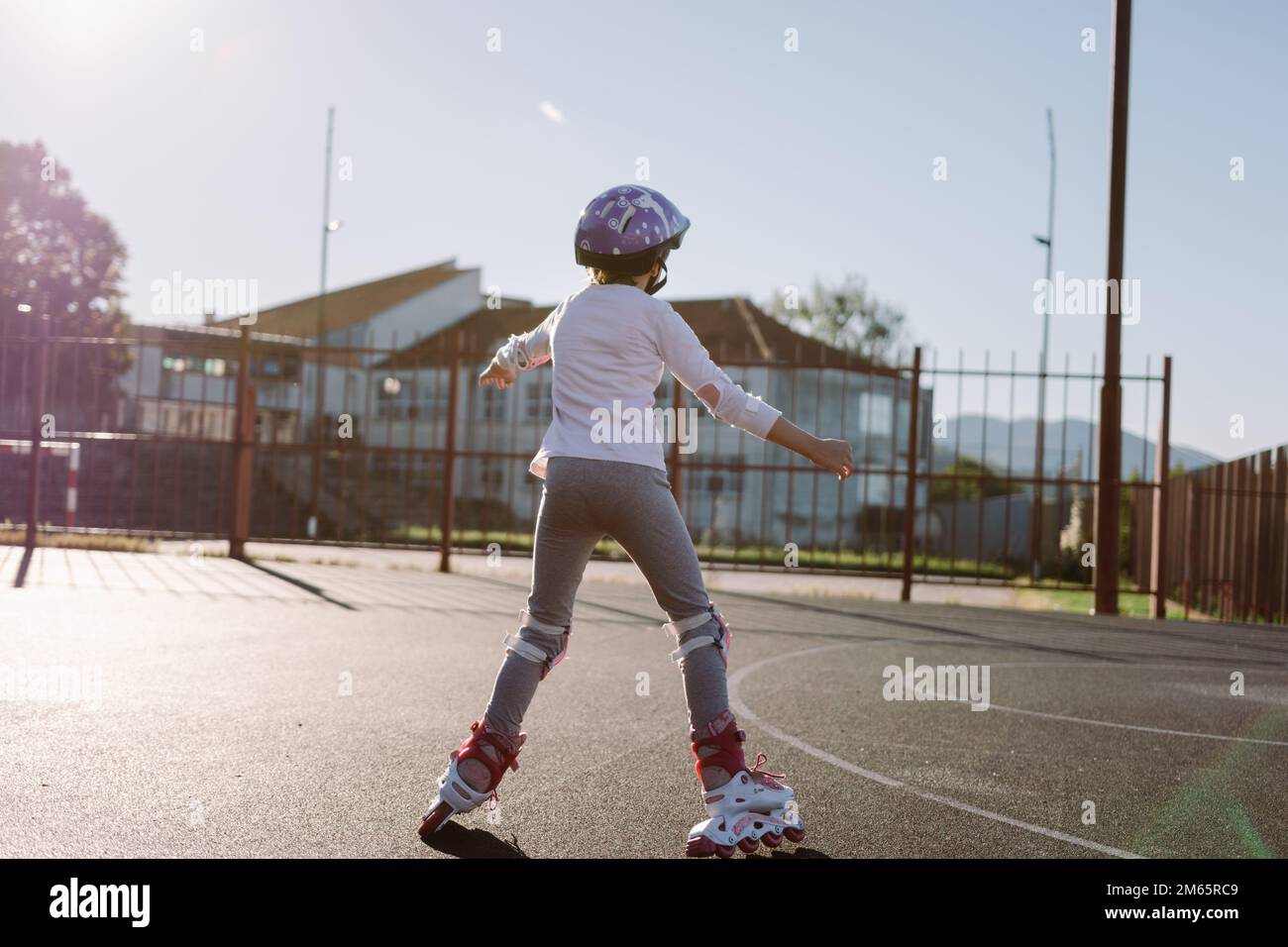 Child inline skating hi-res stock photography and images - Alamy