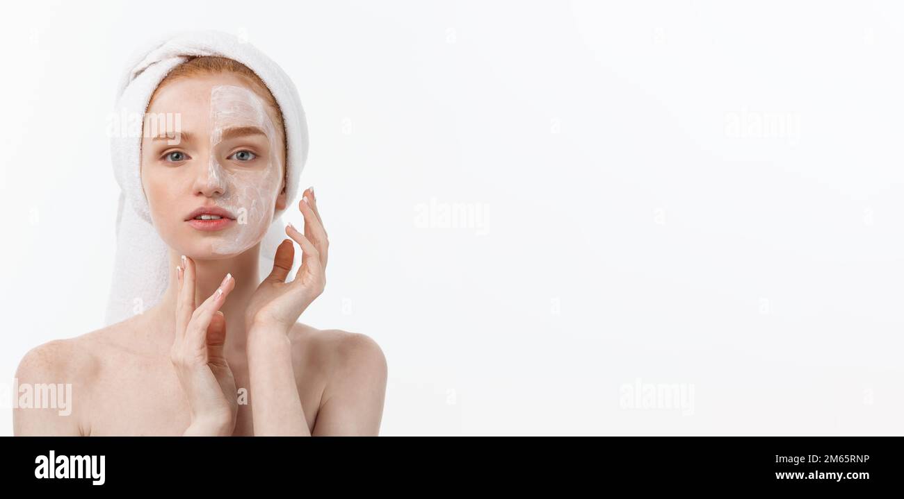 beautiful model applying cosmetic cream treatment on her face on white Stock Photo - Alamy