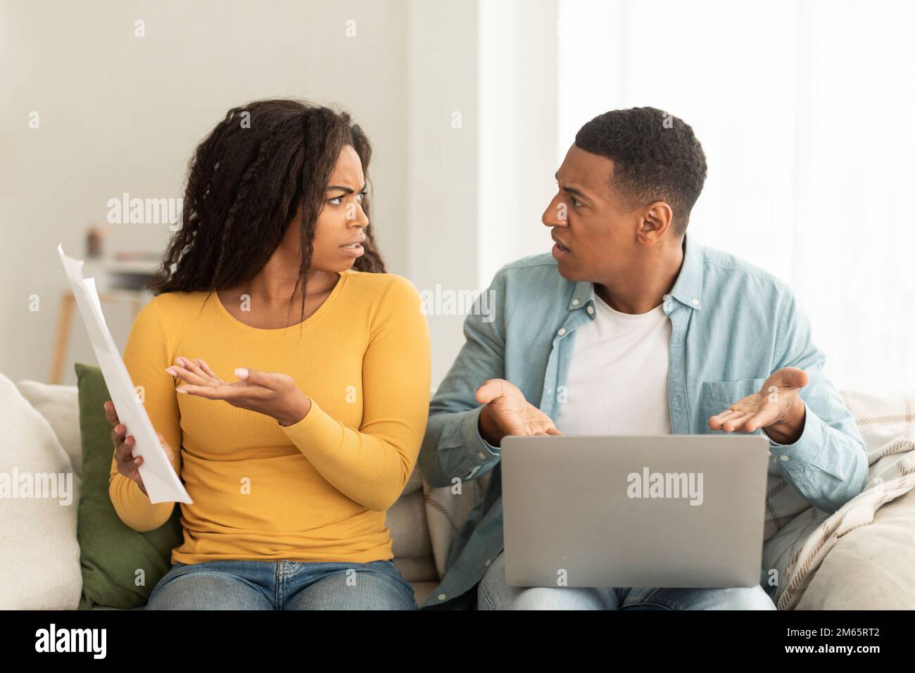 Angry Sad Millennial African American Couple Quarrel Over Debts And