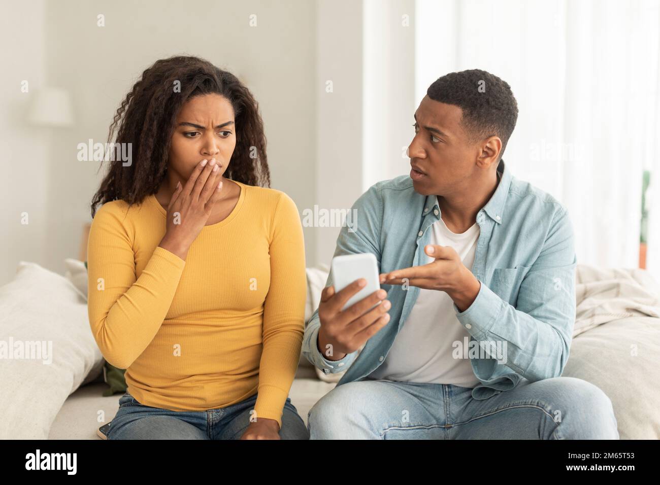 Woman scolding husband hi-res stock photography and images - Alamy