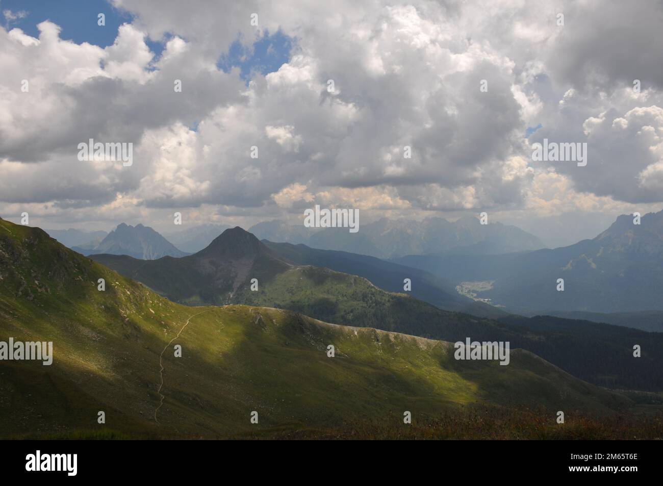 A beautiful landscape of big mountains of the Alps in Italy under the ...
