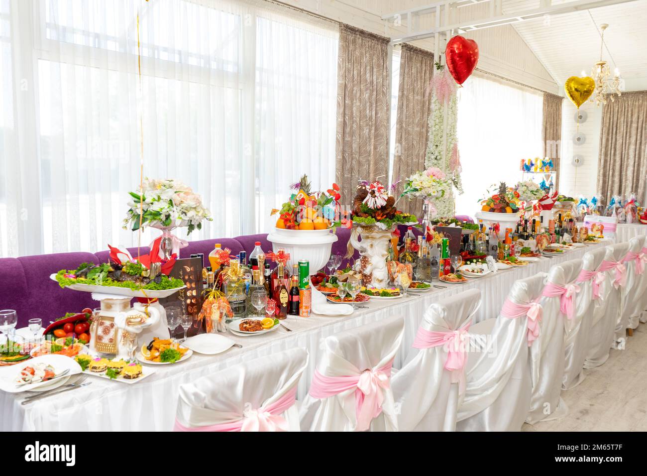 A beautifully served and decorated table in the banquet hall Stock ...