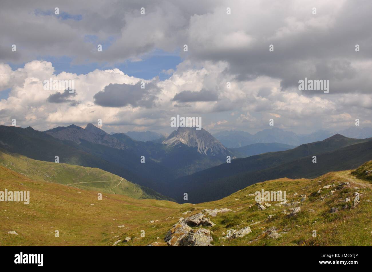 A beautiful landscape of big mountains of the Alps in Italy under the ...