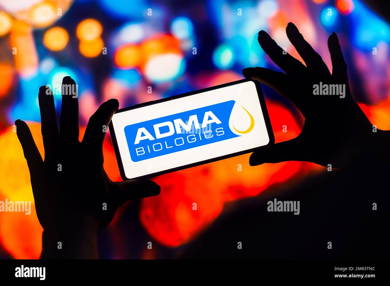 In this photo illustration, the ADMA Biologics logo is displayed on a ...