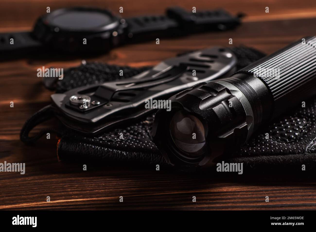 Everyday carry EDC items for men in black color - flashlight, watch and ...