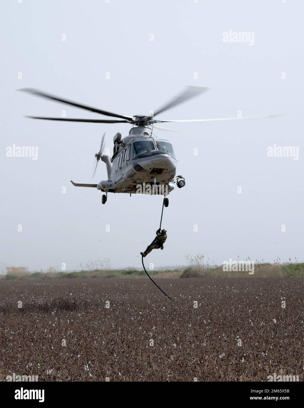 EPITALIOU AIRPORT, Greece – A Greek pararescue member descends from an ...