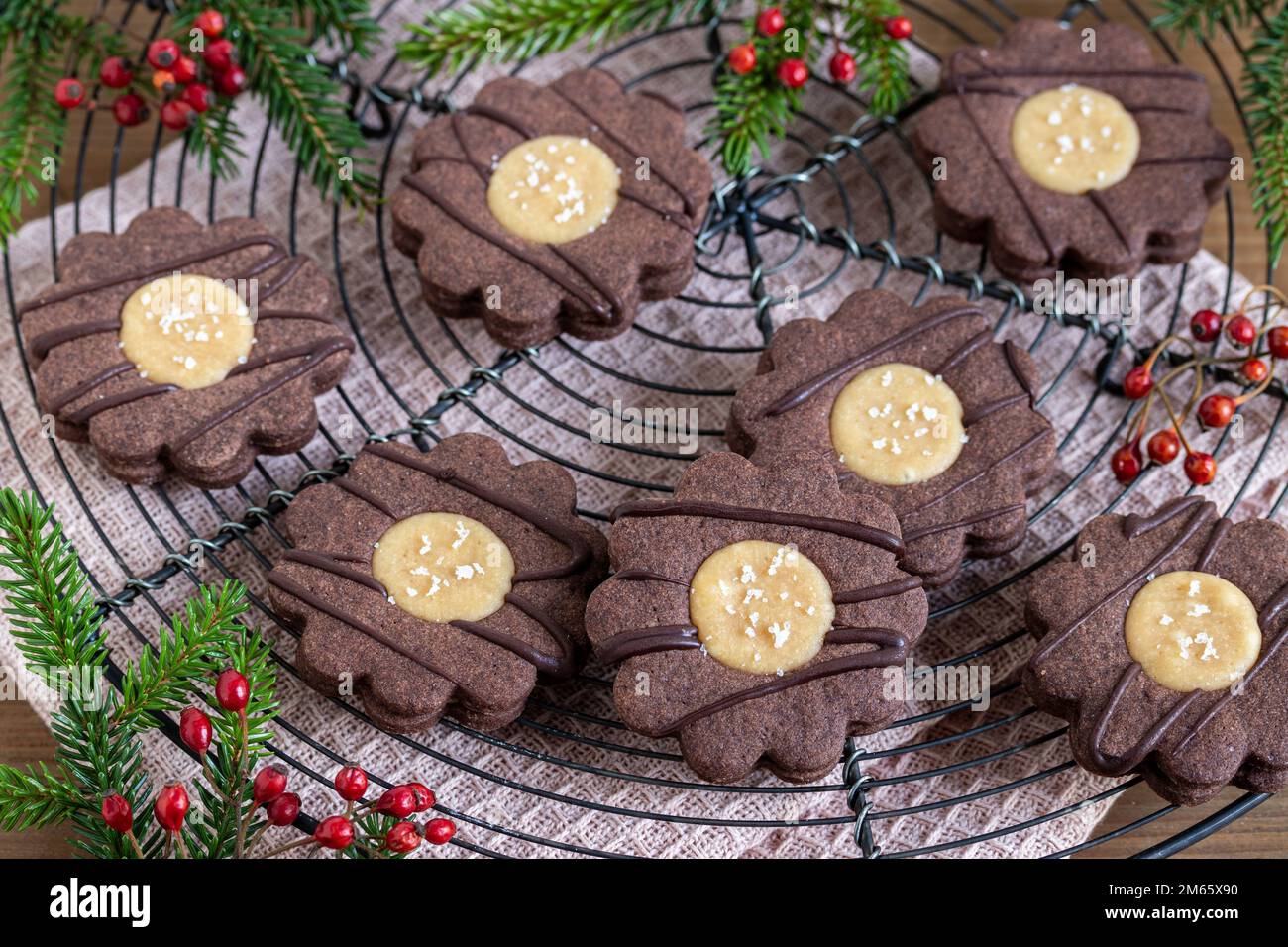 christmas chocolate biscuits Spitzbuben with salted caramel Stock Photo ...