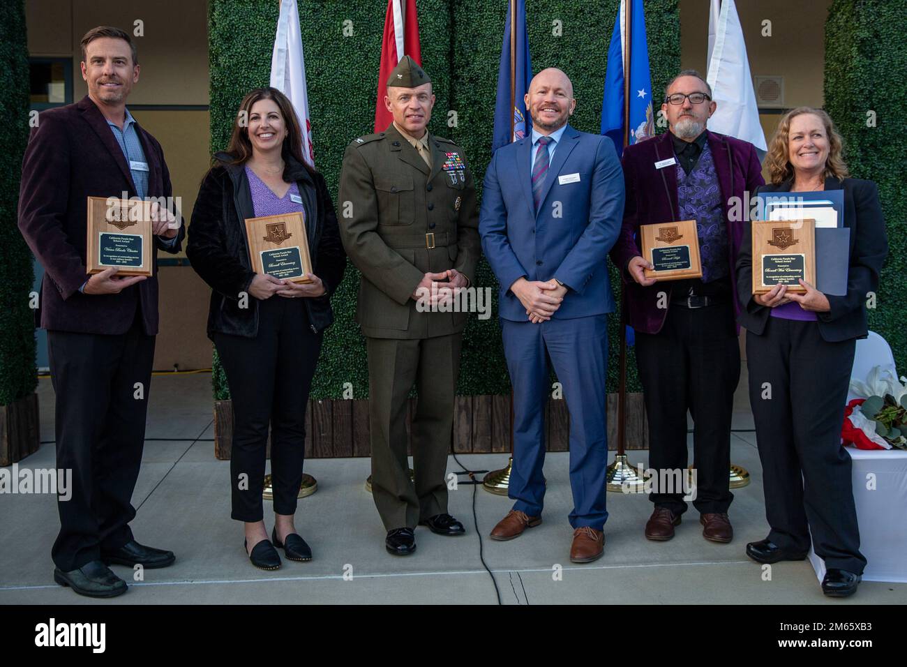 U.S. Marine Col. Daniel Whitley, center, the commanding officer of ...