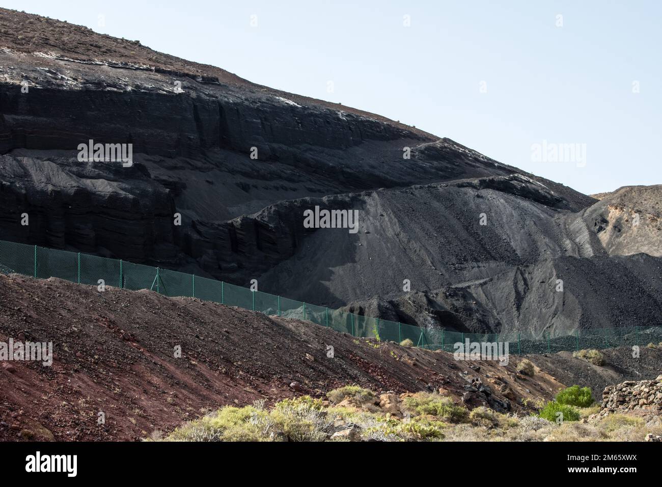 The contrast here between the emerald colored lagoon and the black ...