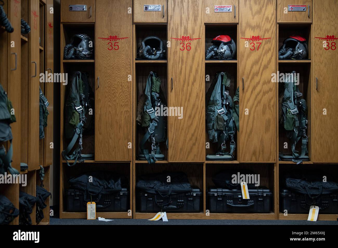 U.S. Air Force A-10C Thunderbolt II pilot gear hangs in wall lockers at ...