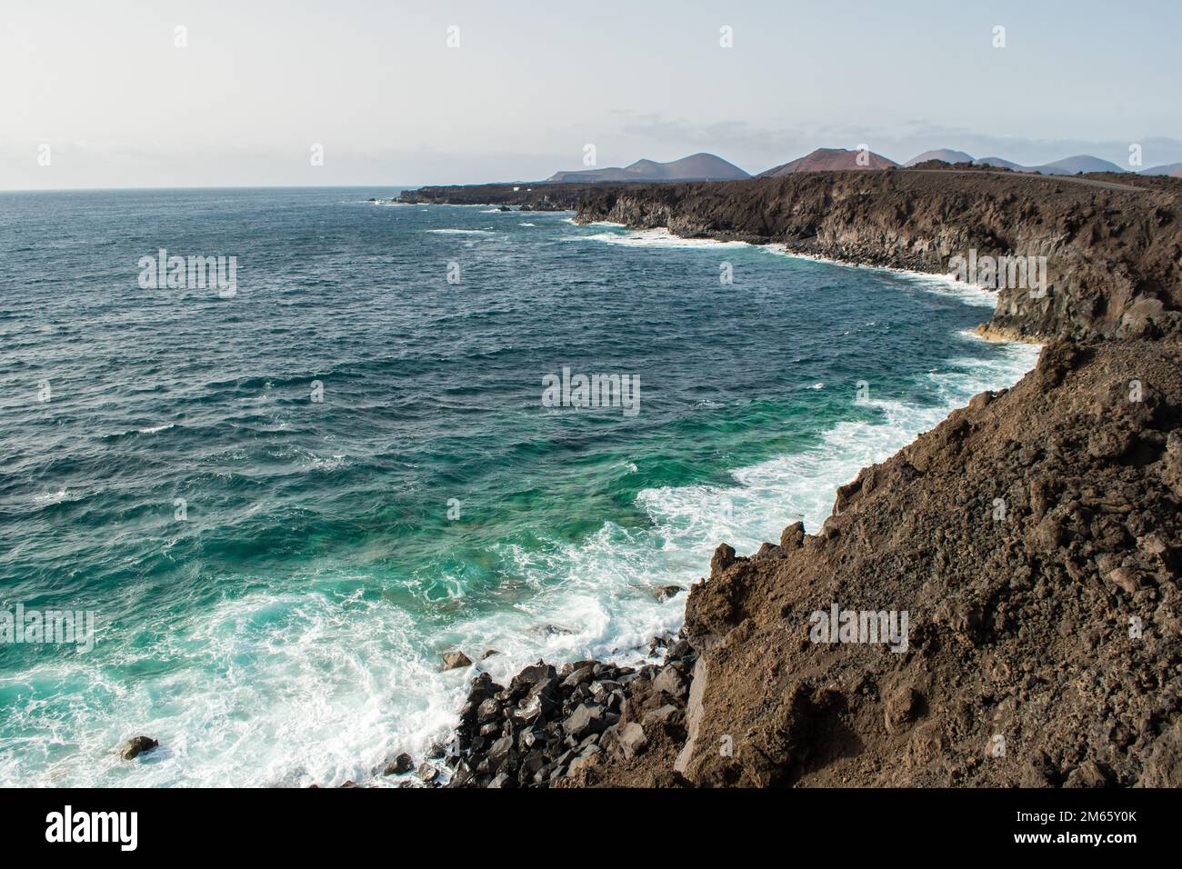 The contrast here between the emerald colored lagoon and the black ...