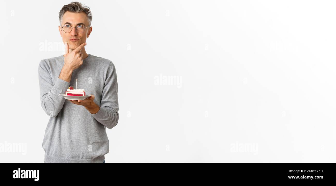 Image of thoughtful and serious middle-aged man, celebrating birthday ...