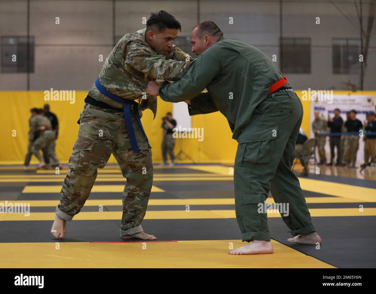 U.S. Army Spc. Hector Urbano (left), a cavalry scout with 1st Battalion ...