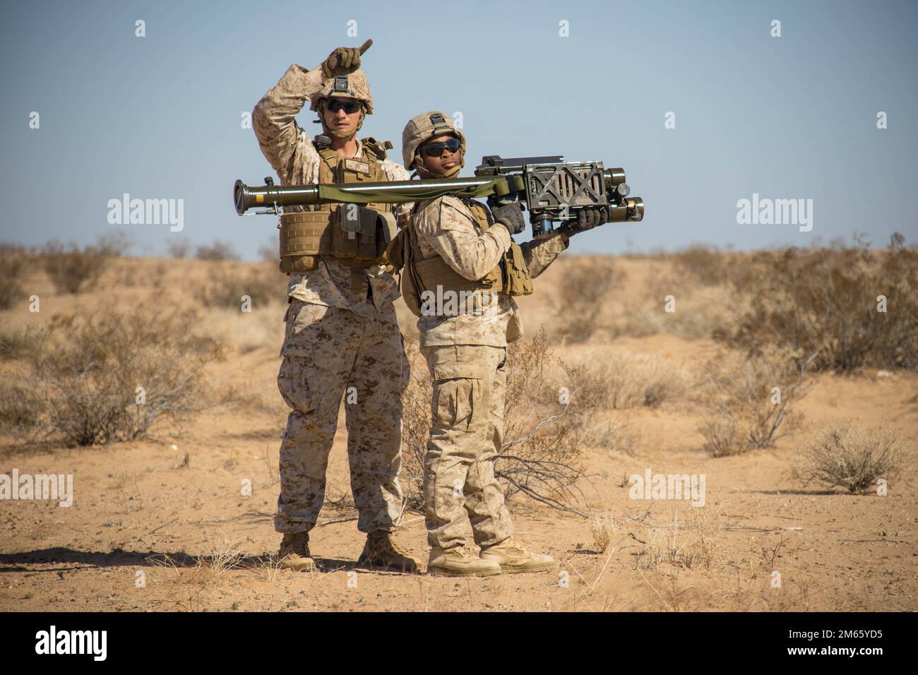 U.S. Marine Corps Staff Sgt. Zachary Runck, left, and Pfc. Matthan ...