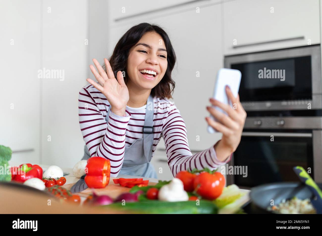 Female cooking influencer shooting video hi-res stock photography and ...
